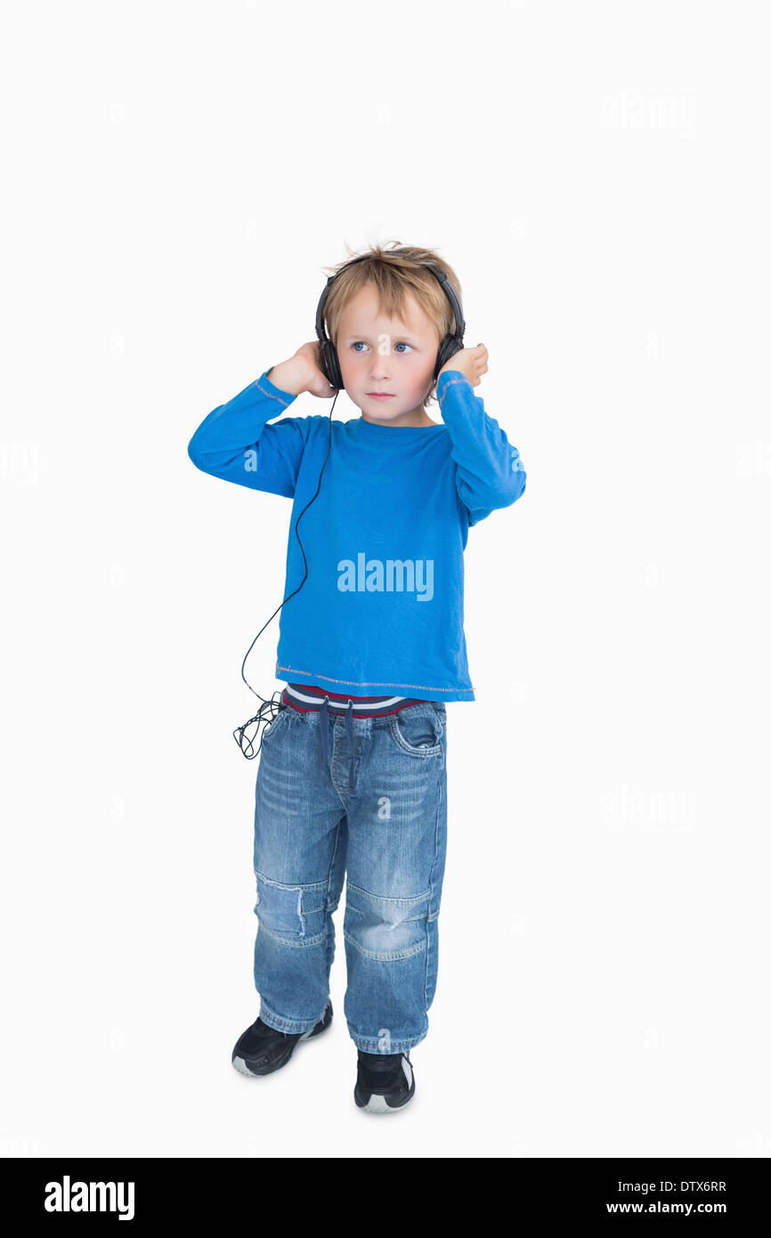 Boy listening Cut Out Stock Images & Pictures - Alamy