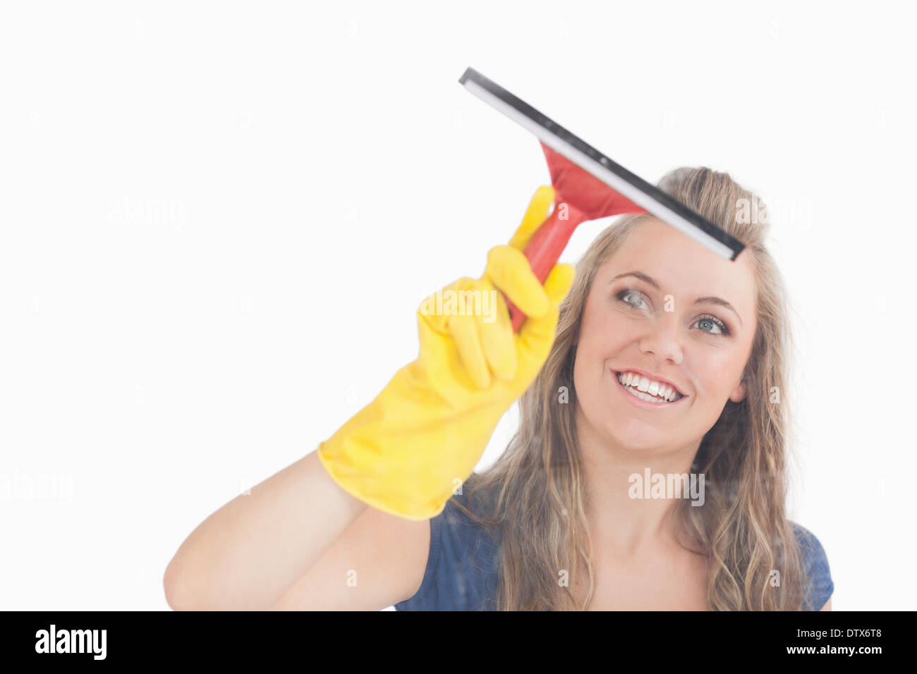 Young maid in yellow gloves using wiper Stock Photo - Alamy