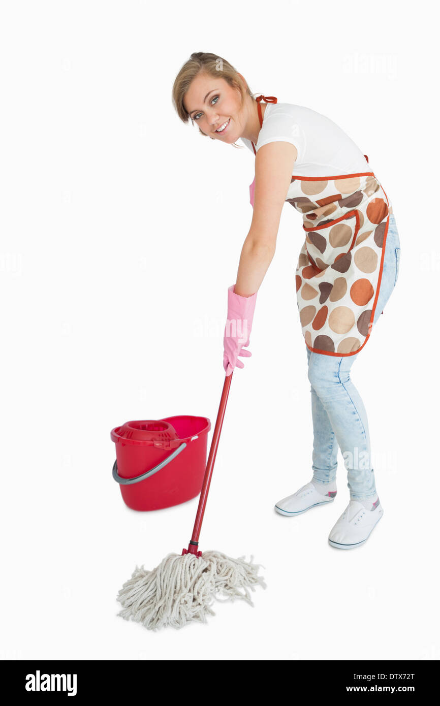 Young housekeeping maid cleaning Cut Out Stock Images & Pictures - Alamy