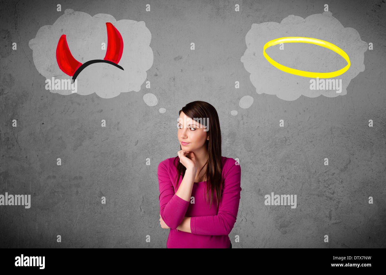 Woman choosing between good and bad Stock Photo - Alamy