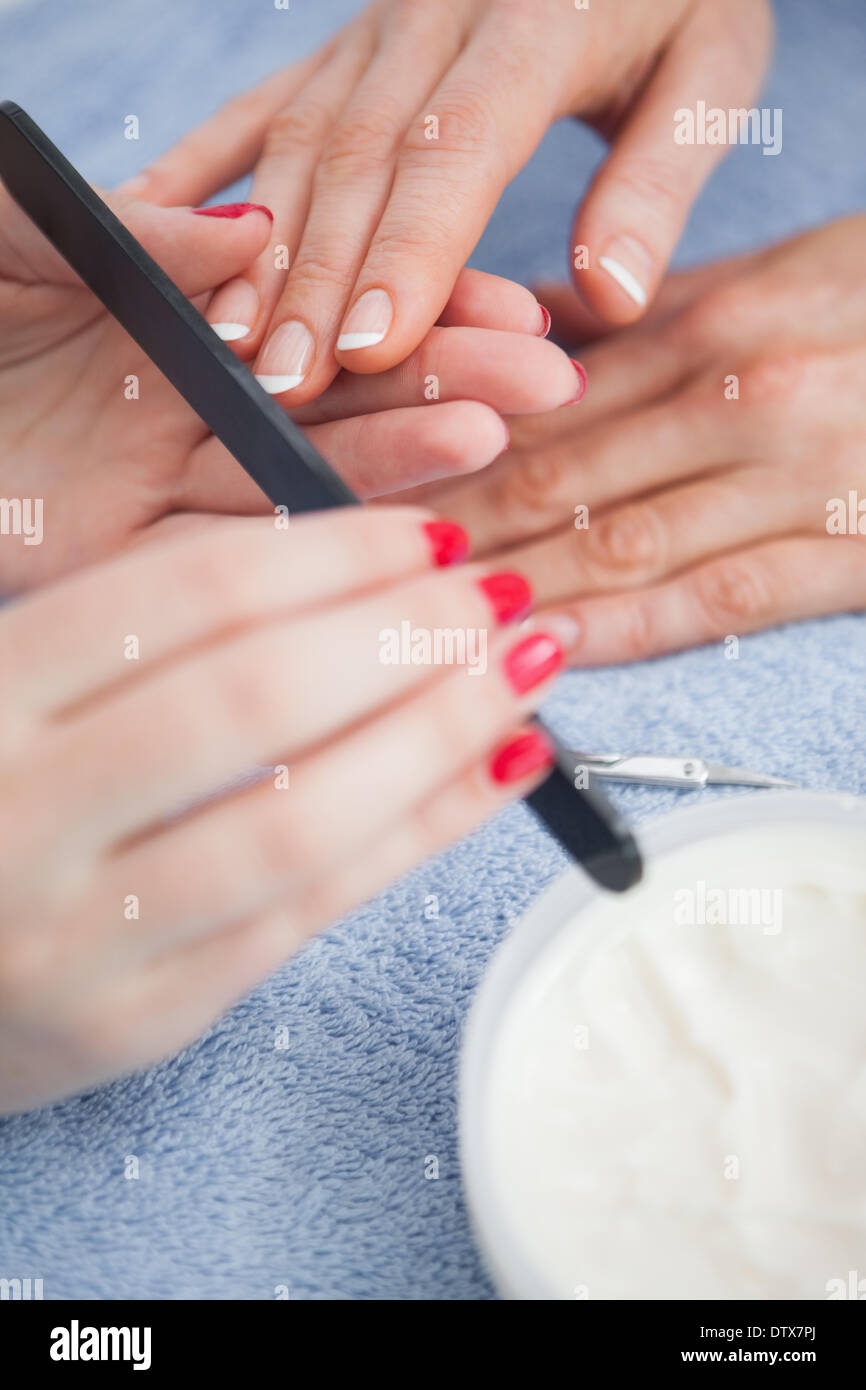 Close up hands manicurist filing hi-res stock photography and images ...
