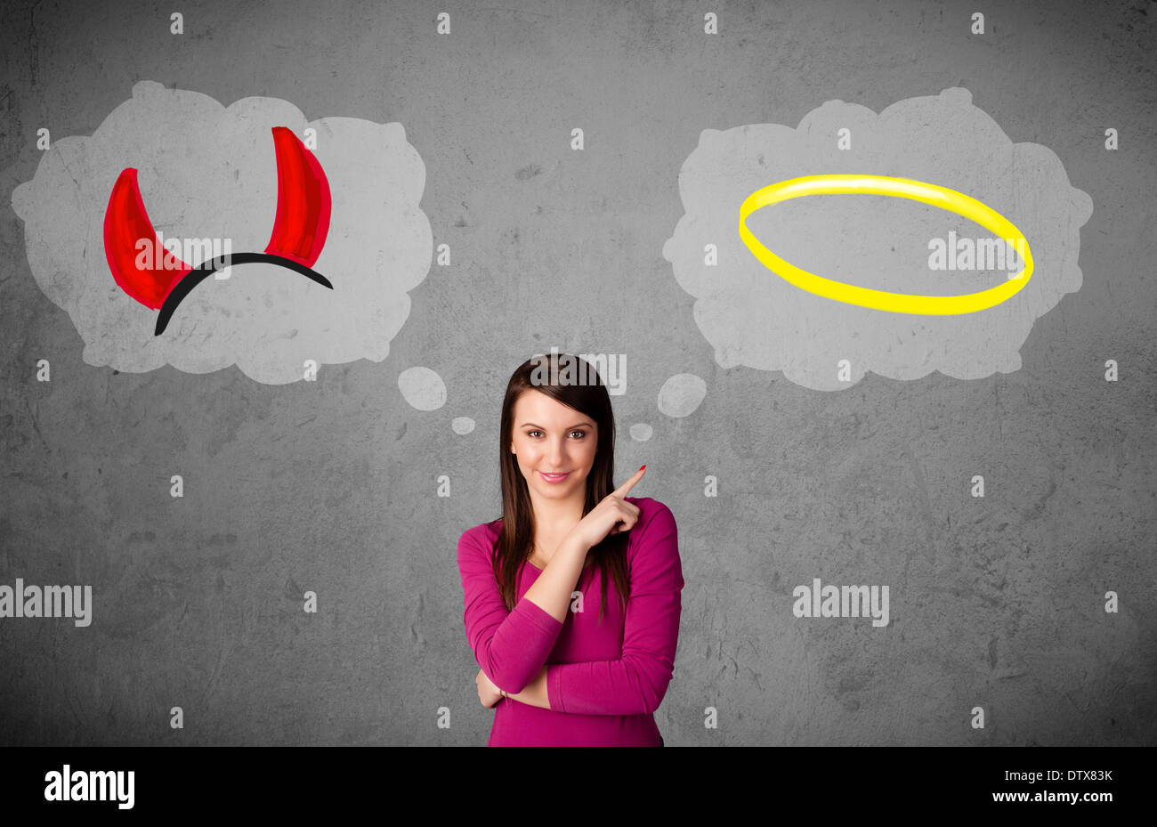 Woman choosing between good and bad Stock Photo - Alamy