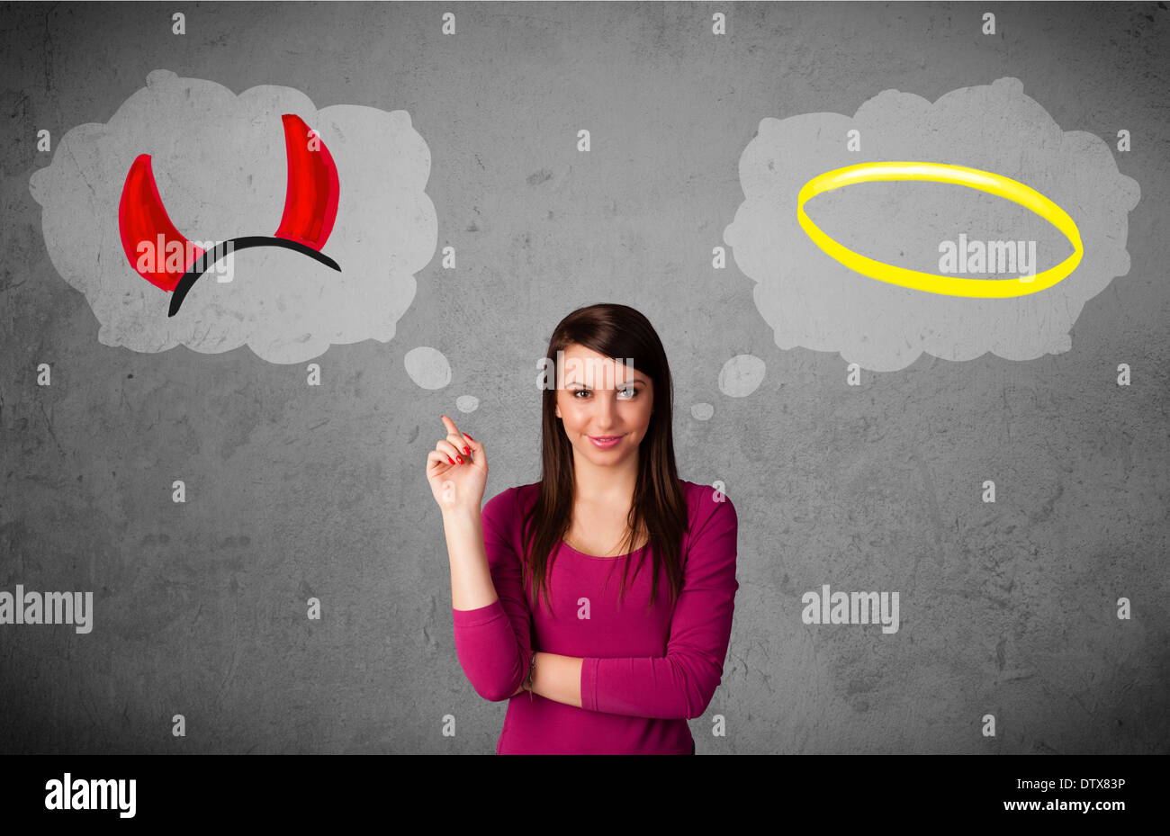 Woman choosing between good and bad Stock Photo - Alamy