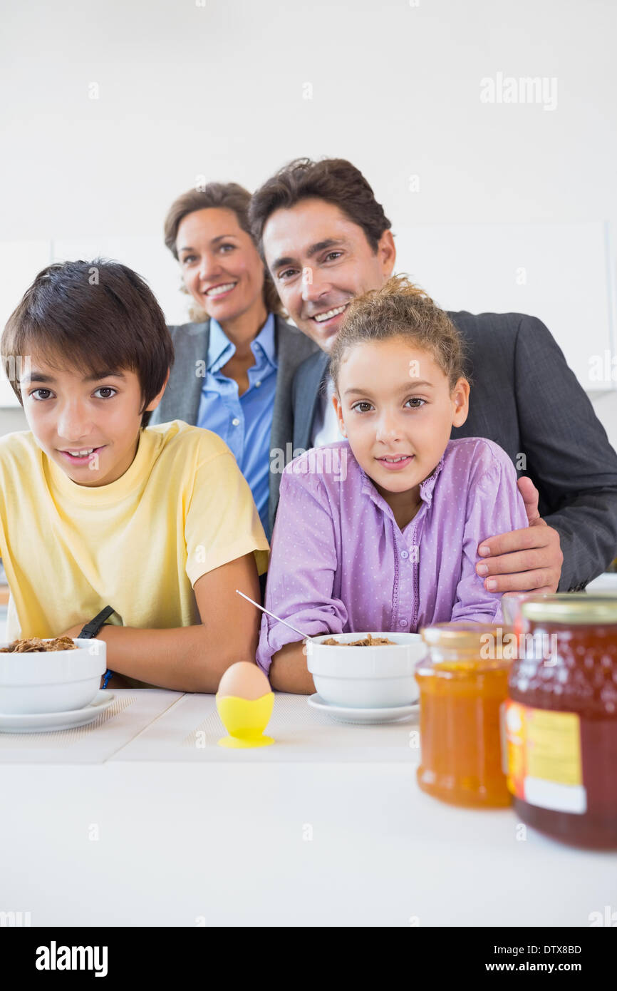 Happy family having breakfast Stock Photo - Alamy