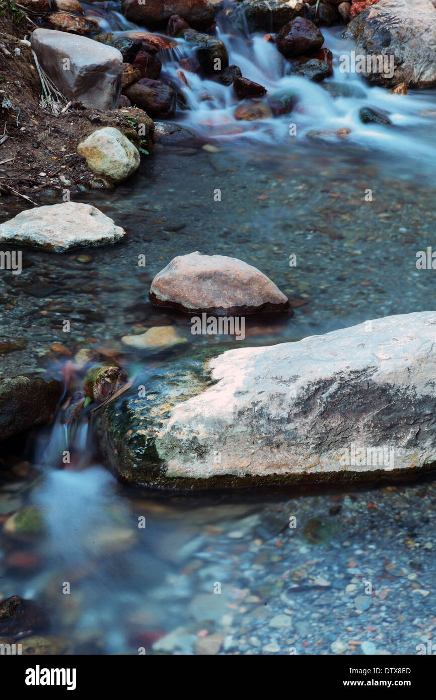 Water flowing from sulphur spring Stock Photo - Alamy