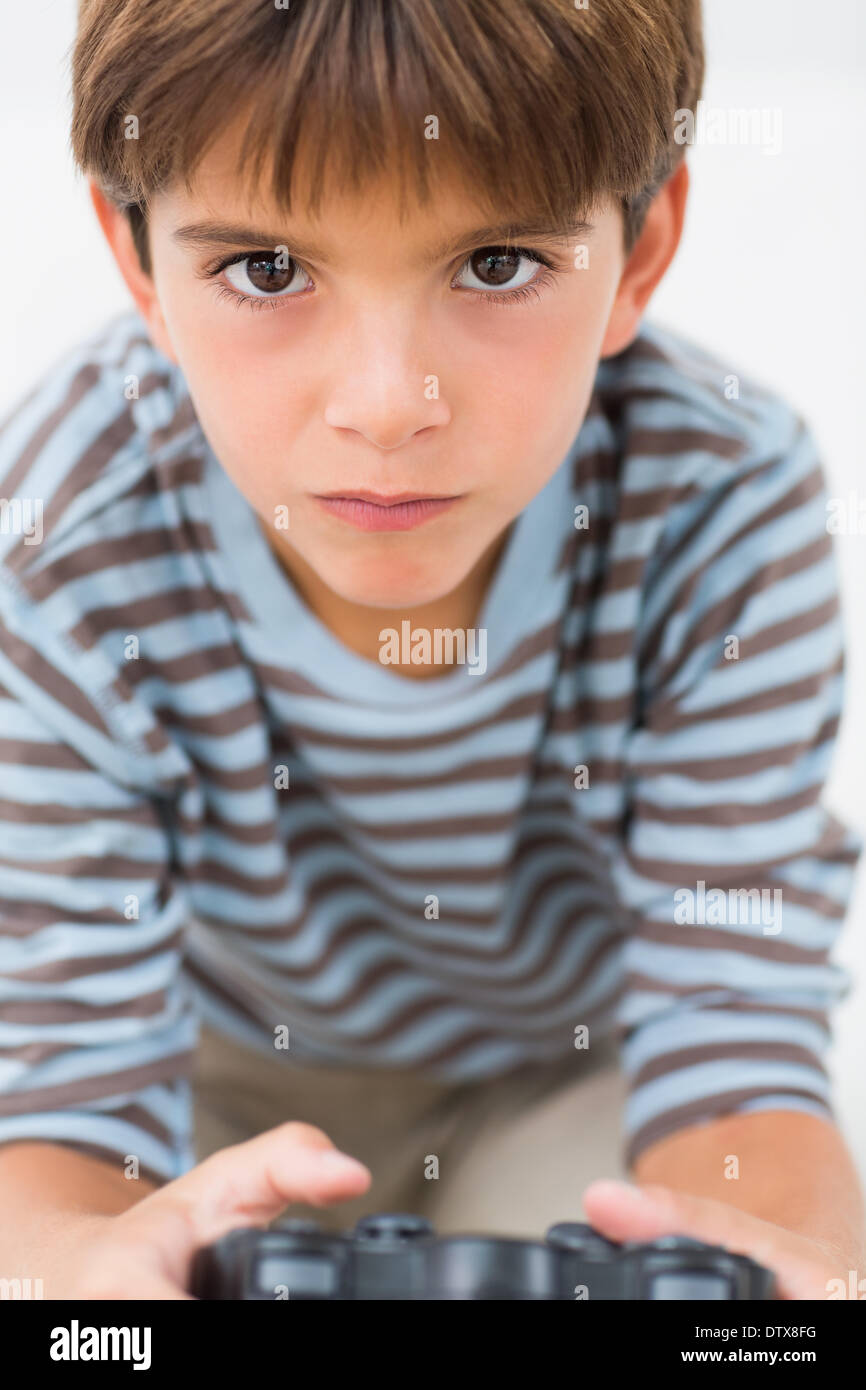 Little boy playing games console Stock Photo - Alamy