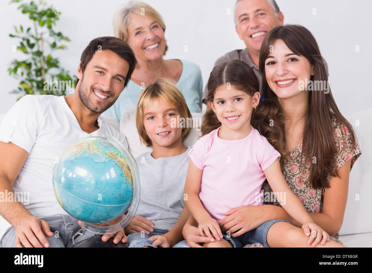 Family globe hi-res stock photography and images - Alamy