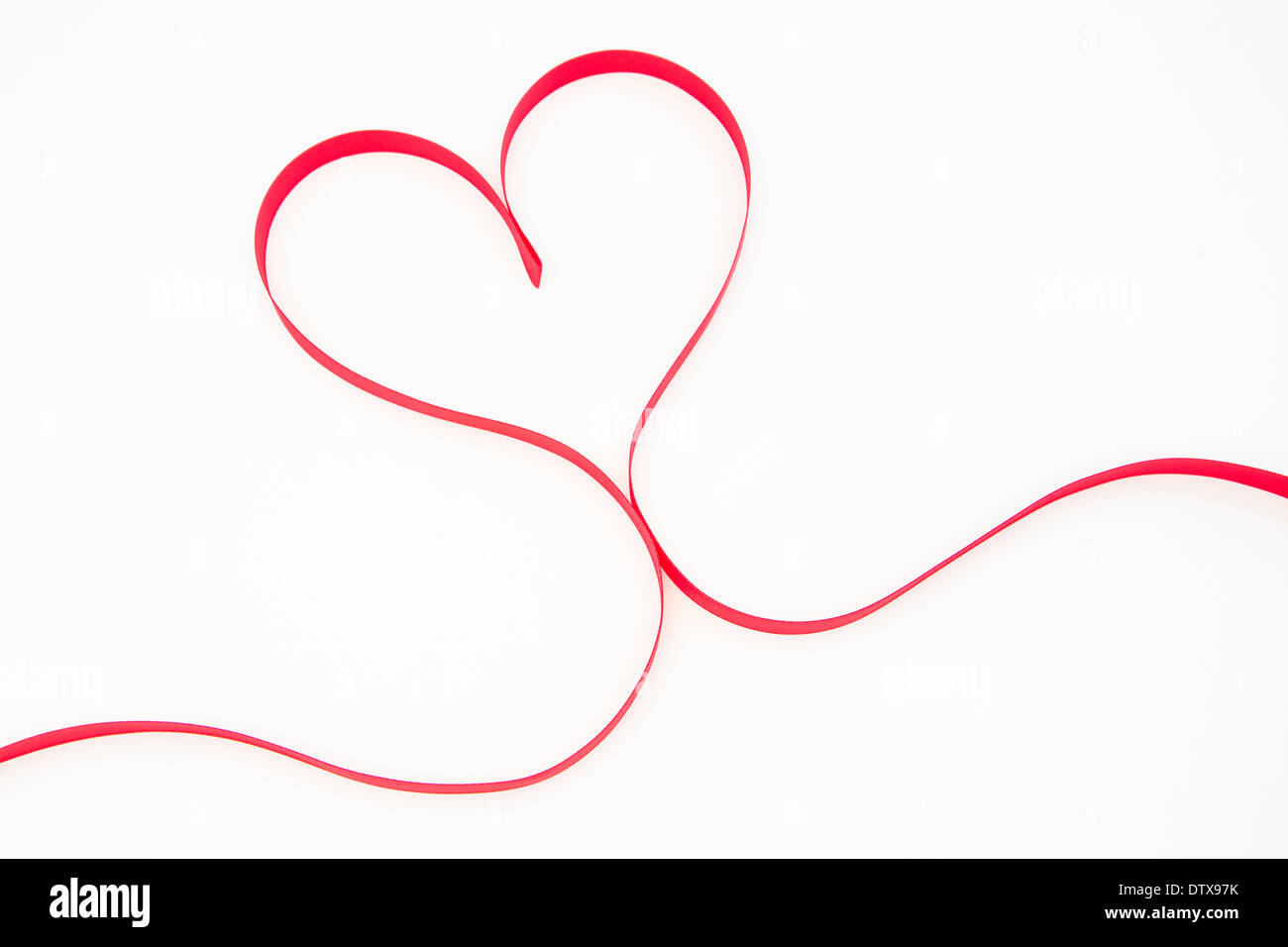 Heart shaped pink ribbon Stock Photo - Alamy