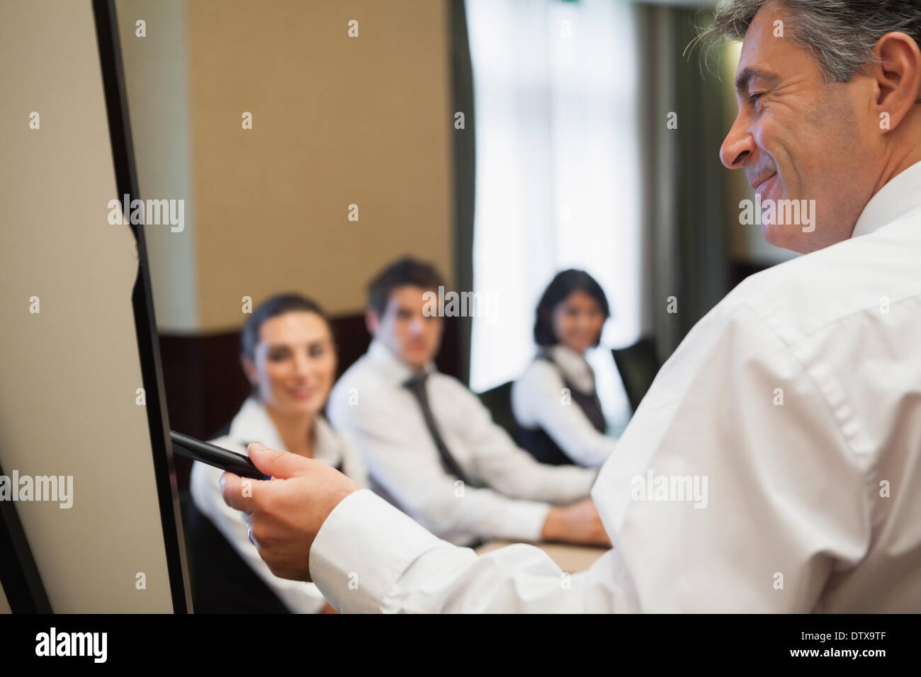 Man giving business presentation Stock Photo - Alamy