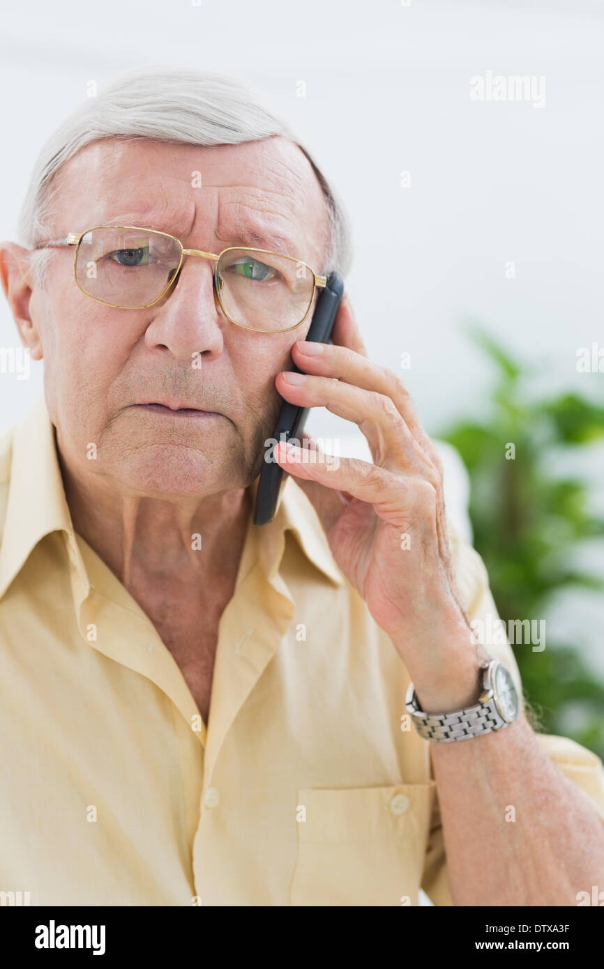 Elderly telephone unhappy hi-res stock photography and images - Alamy