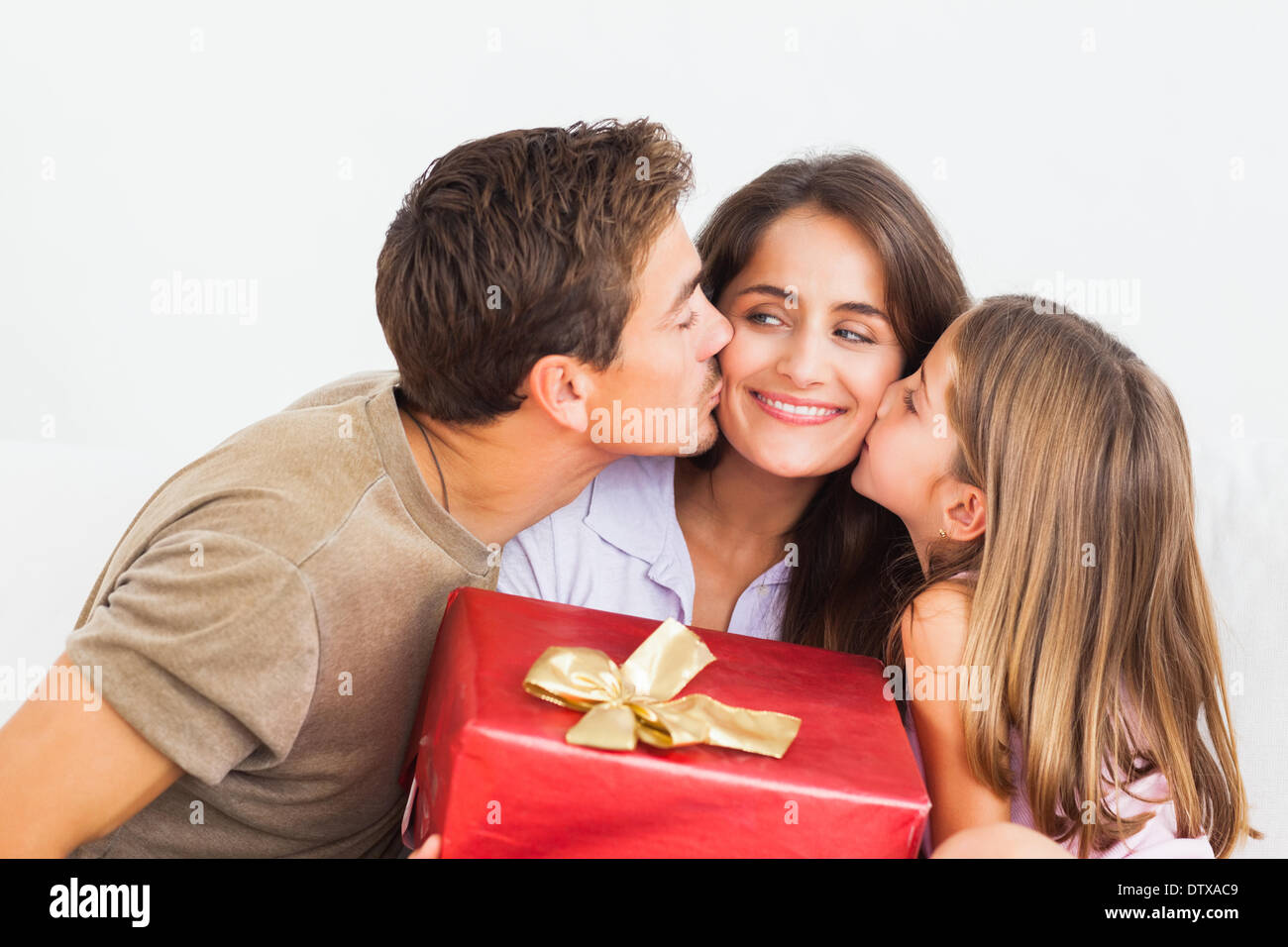 Child offering gift hi-res stock photography and images - Alamy