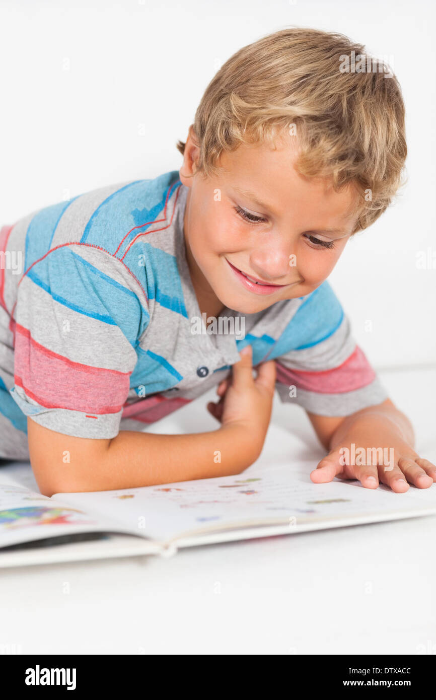 Happy boy reading hi-res stock photography and images - Alamy