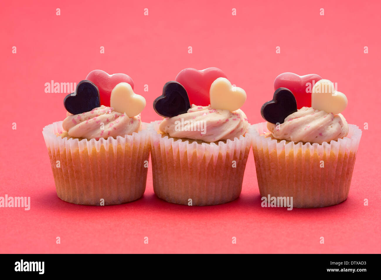 Three cupcakes in row hi-res stock photography and images - Alamy