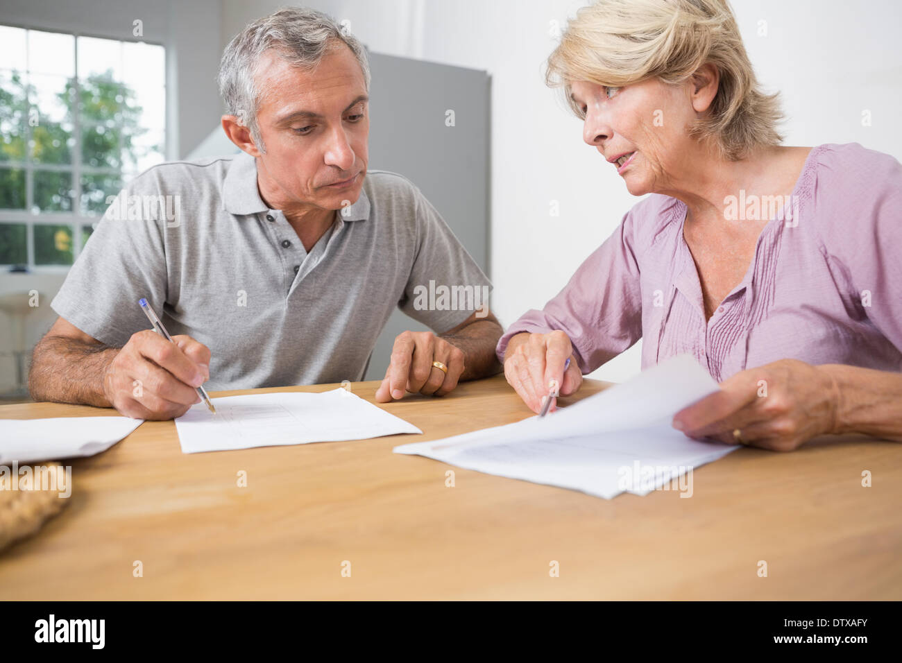Couple discussing contract hi-res stock photography and images - Alamy