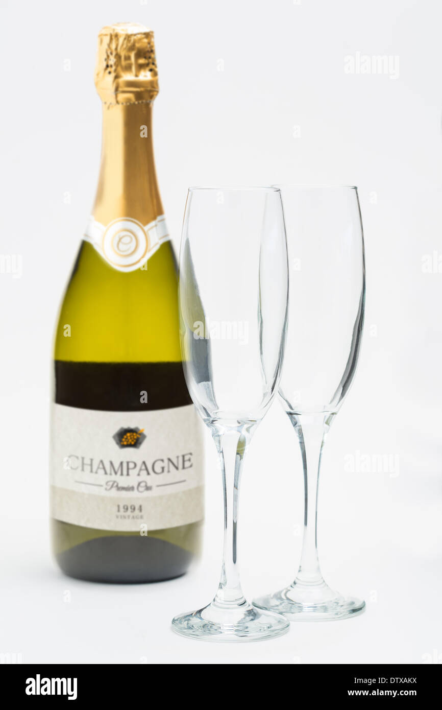 Bottle of champagne with two flutes Stock Photo - Alamy