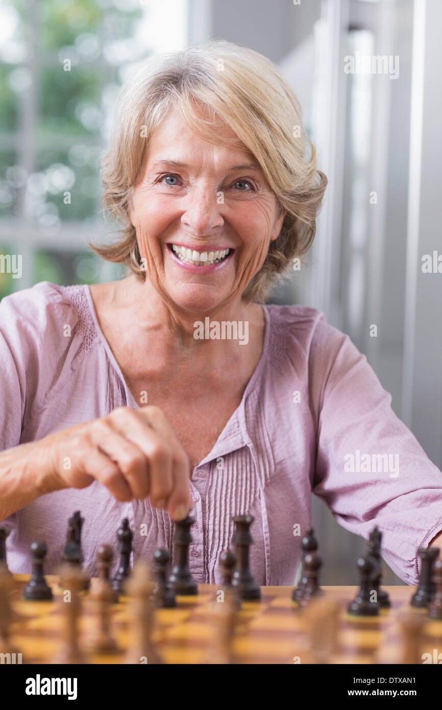 Chess board enjoying hi-res stock photography and images - Alamy