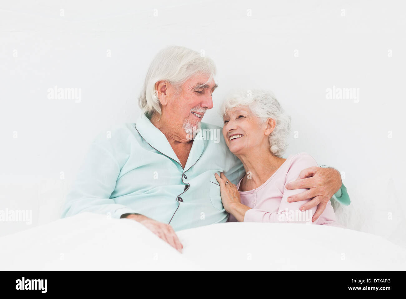 Elderly couple in bed Stock Photo - Alamy
