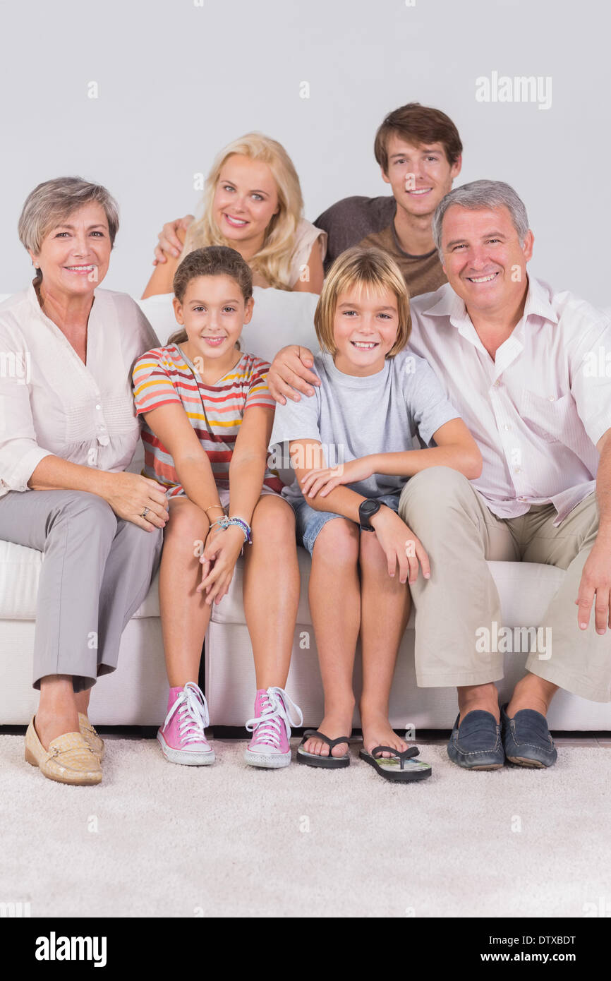 Family portrait looking at camera Stock Photo - Alamy