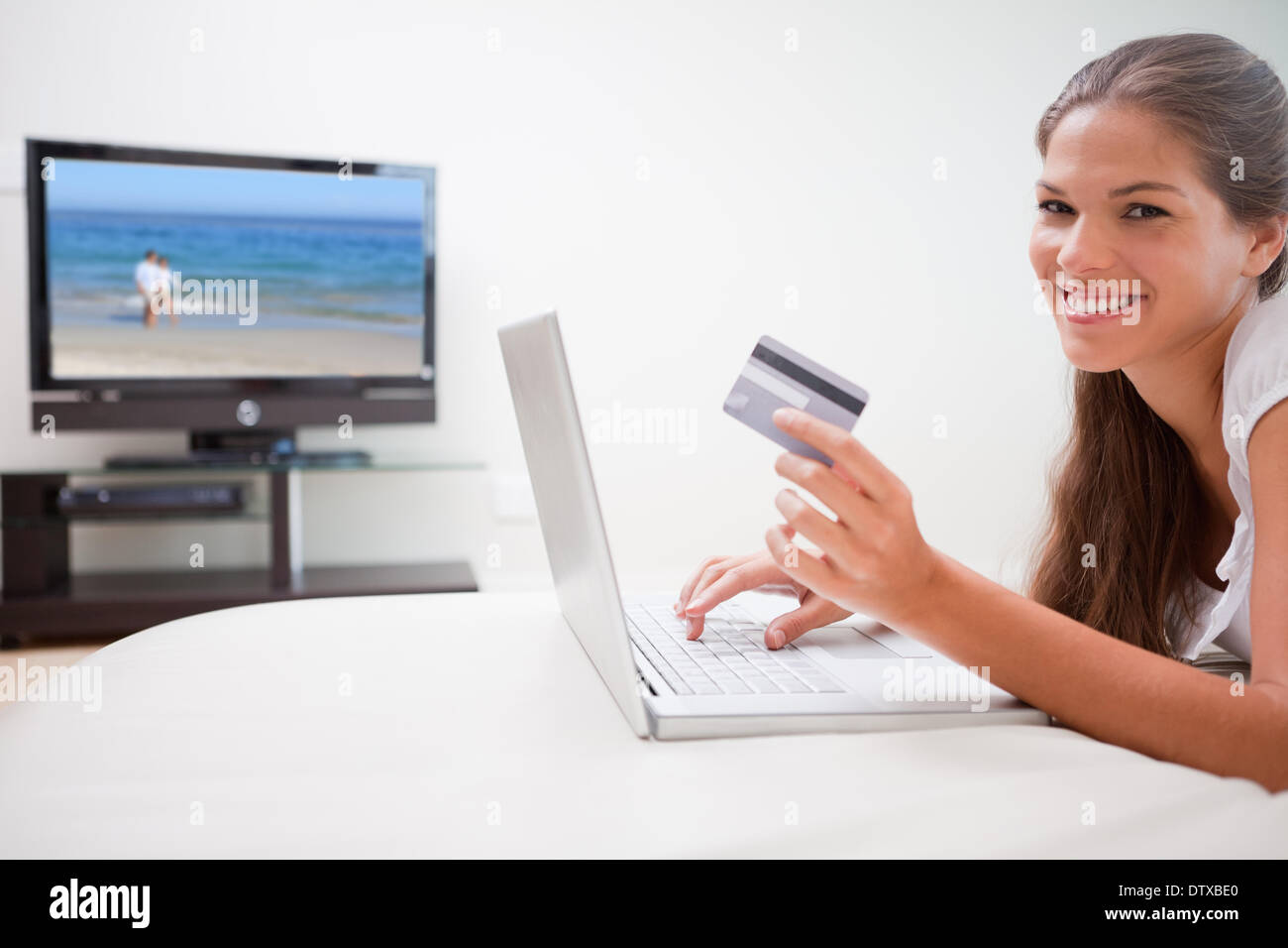 Woman just booked flight online Stock Photo - Alamy