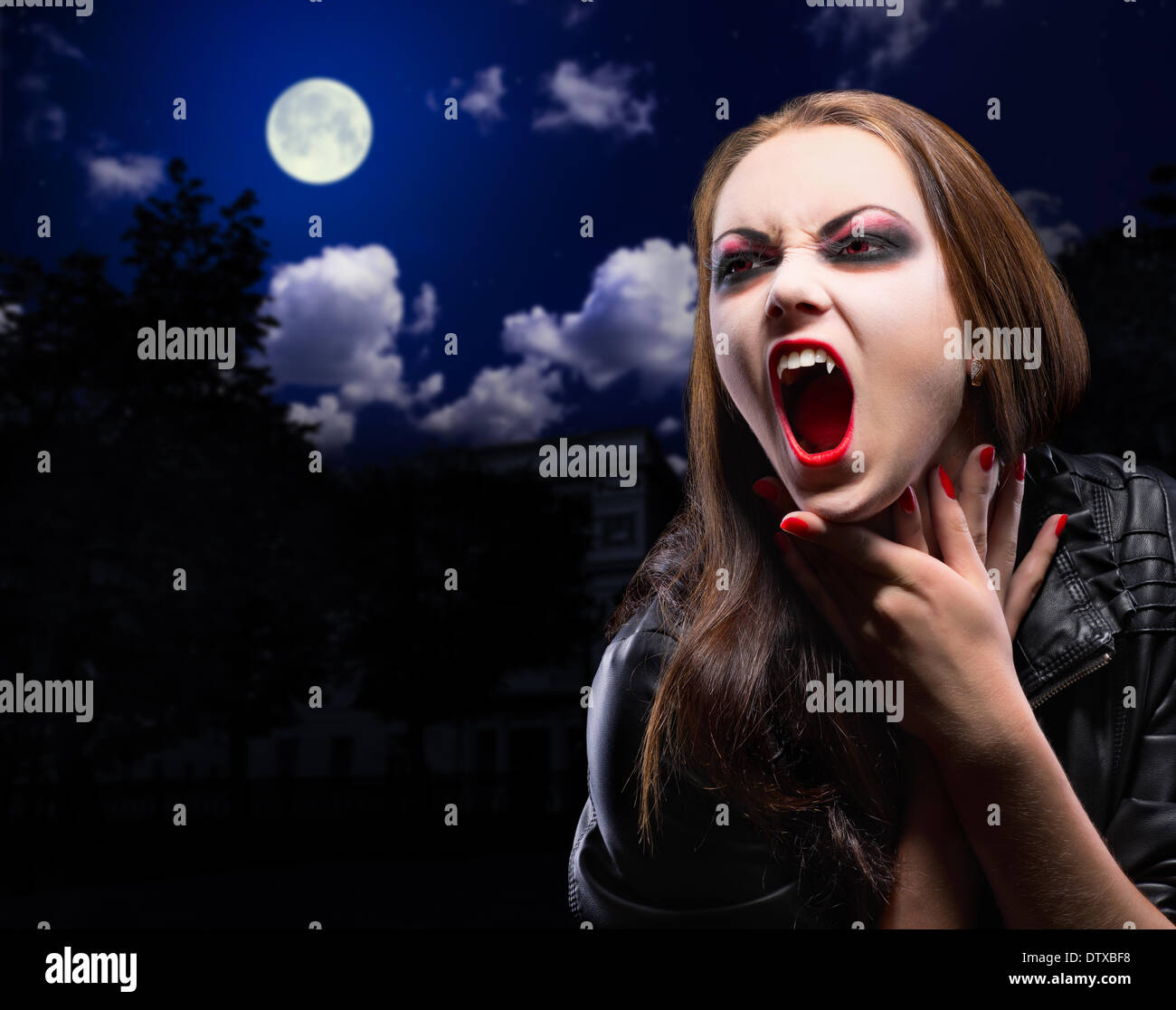Vampire woman on night background with moon Stock Photo - Alamy