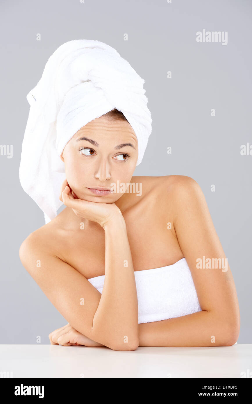 Beautiful serene woman wearing white towels Stock Photo - Alamy