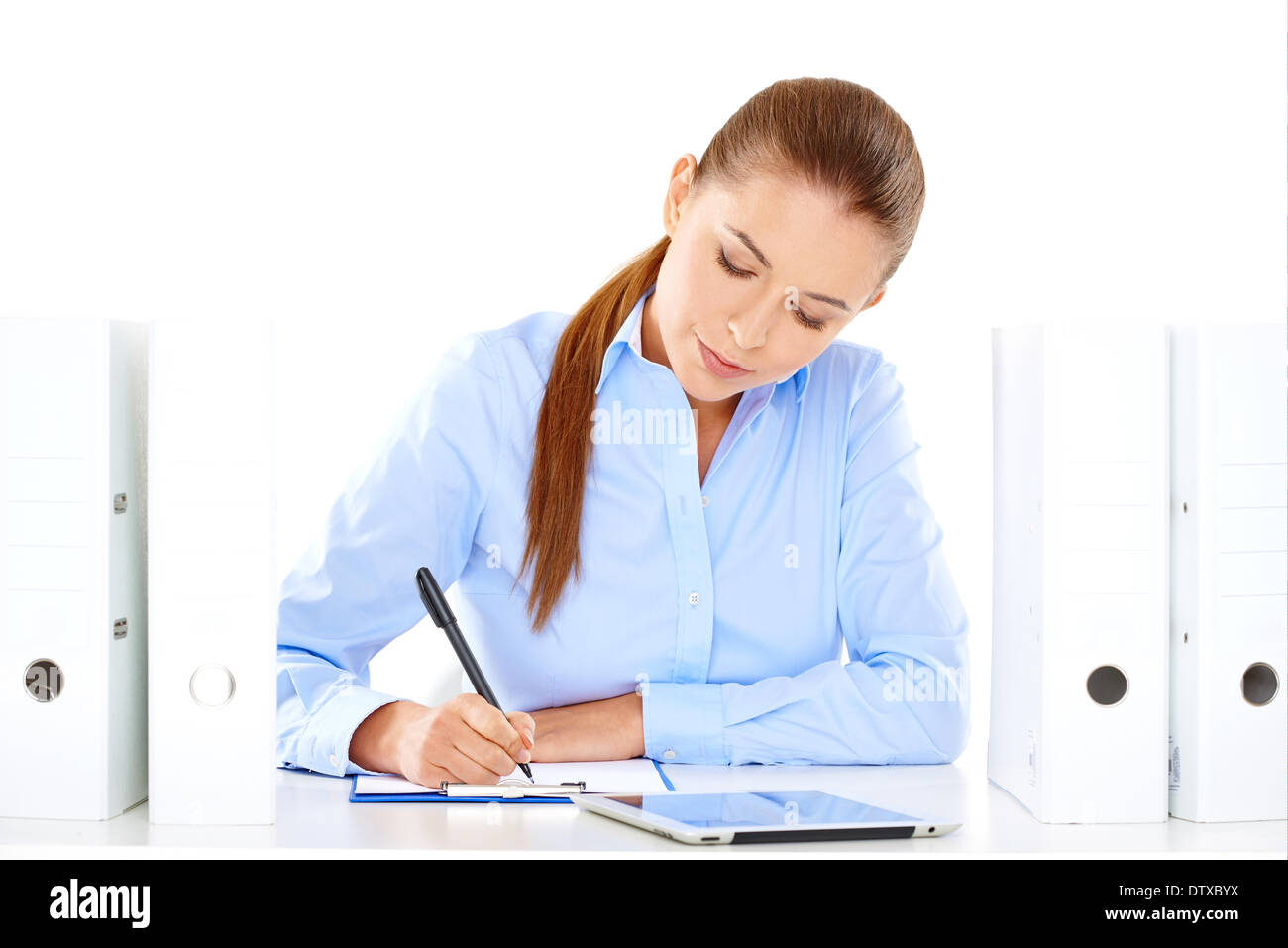 Efficient businesswoman working at her desk Stock Photo - Alamy