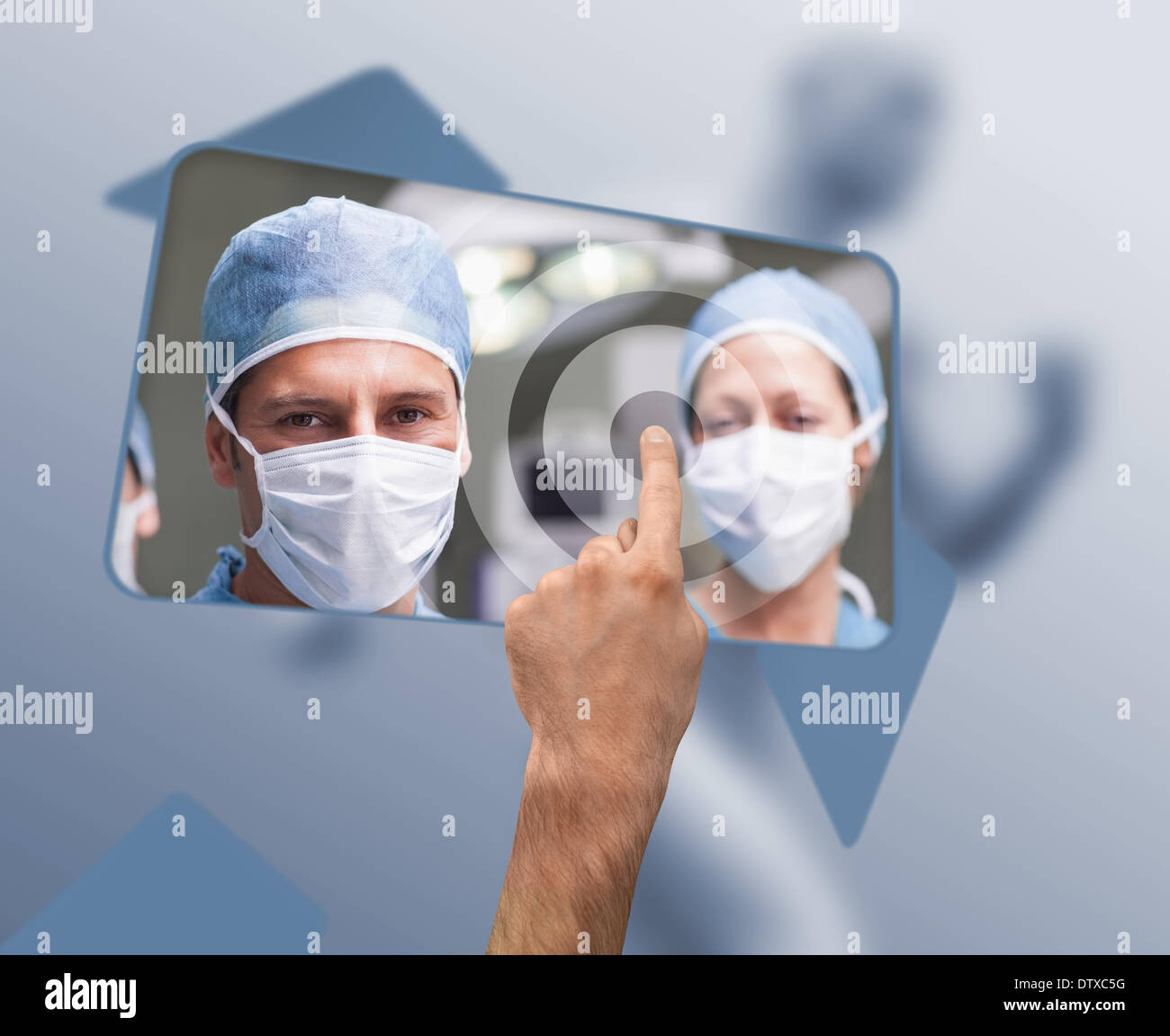Hand selecting image of surgeons Stock Photo - Alamy