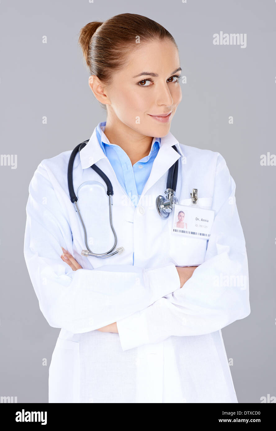 Female doctor crossed arms hi-res stock photography and images - Alamy