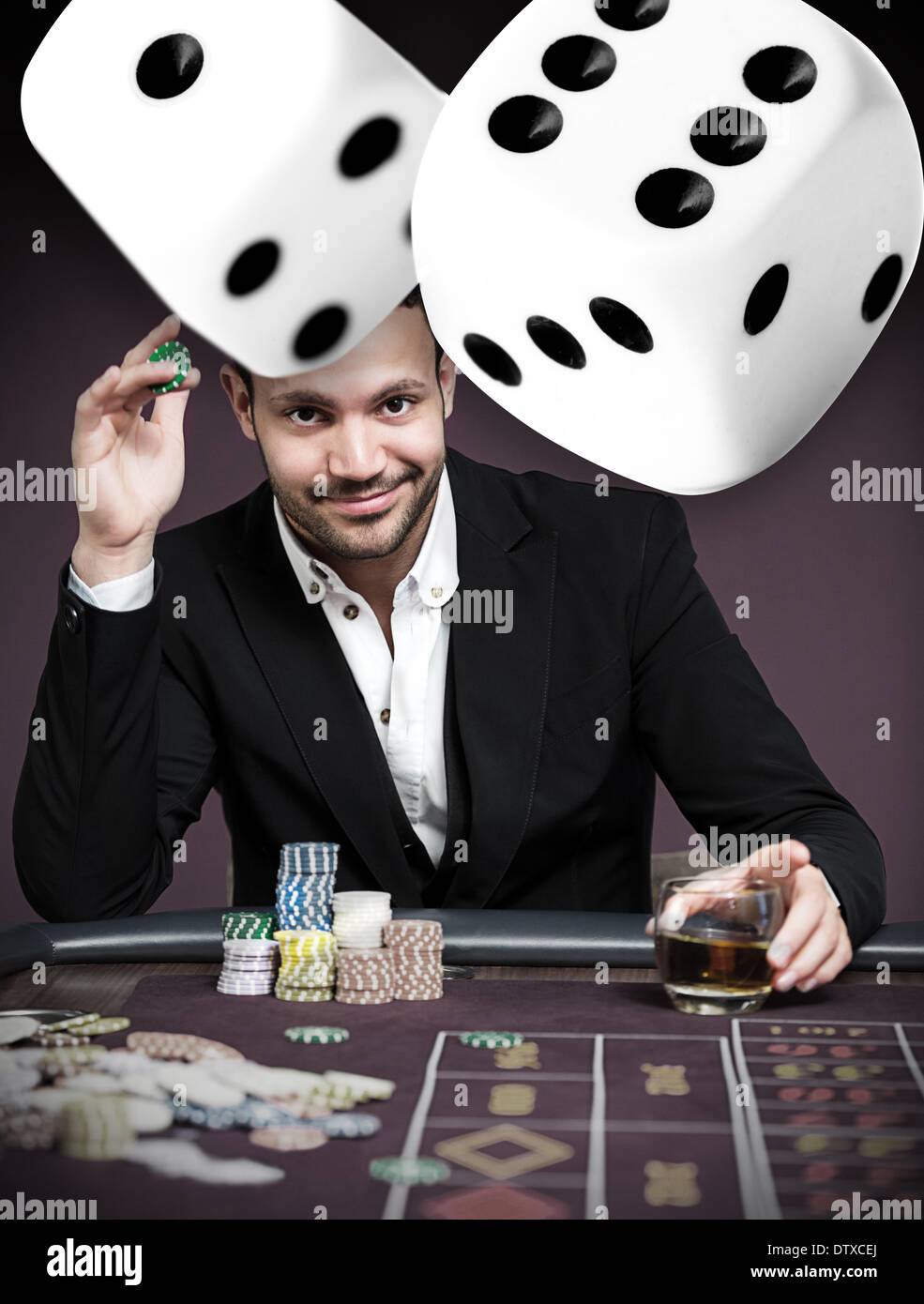 Smiling gambler hi-res stock photography and images - Alamy