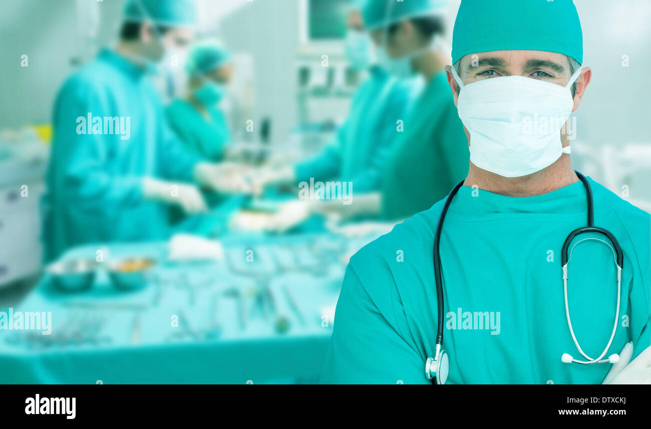 Doctor standing in operating room Stock Photo - Alamy