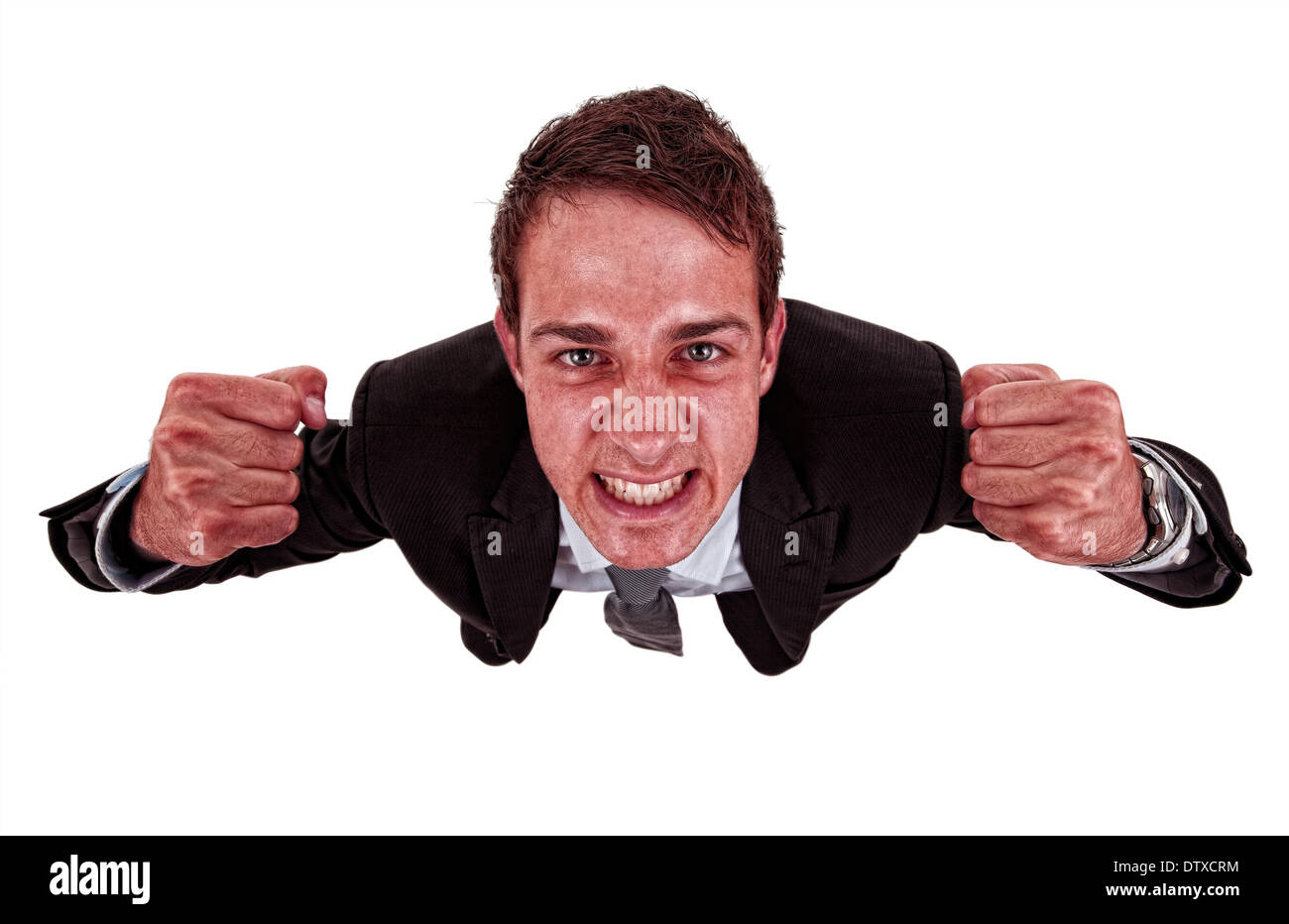 Angry business man with red exploding face Stock Photo - Alamy