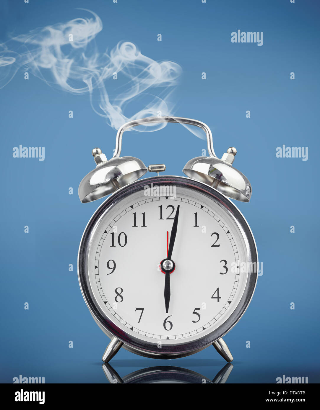 Smoking alarm clock Stock Photo - Alamy