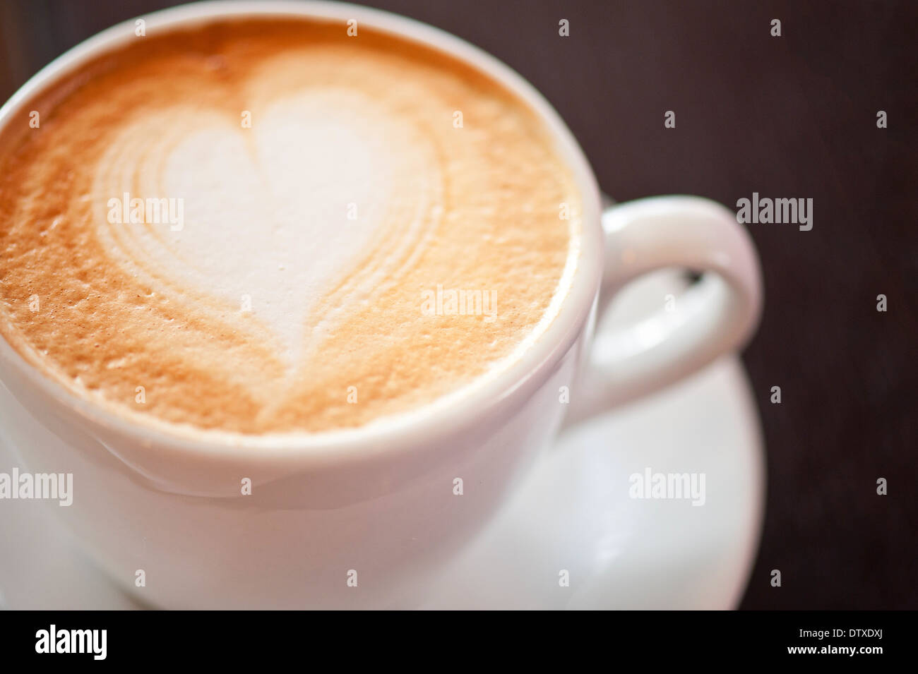 Coffee heart shape Stock Photo - Alamy