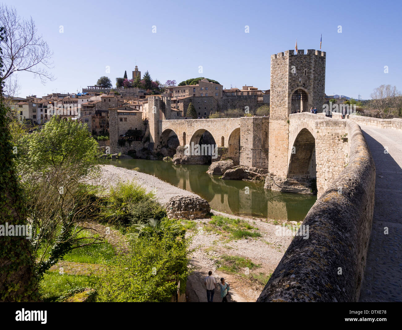 The fortified bridge into Besalu. A fortified stone bridge connects ...