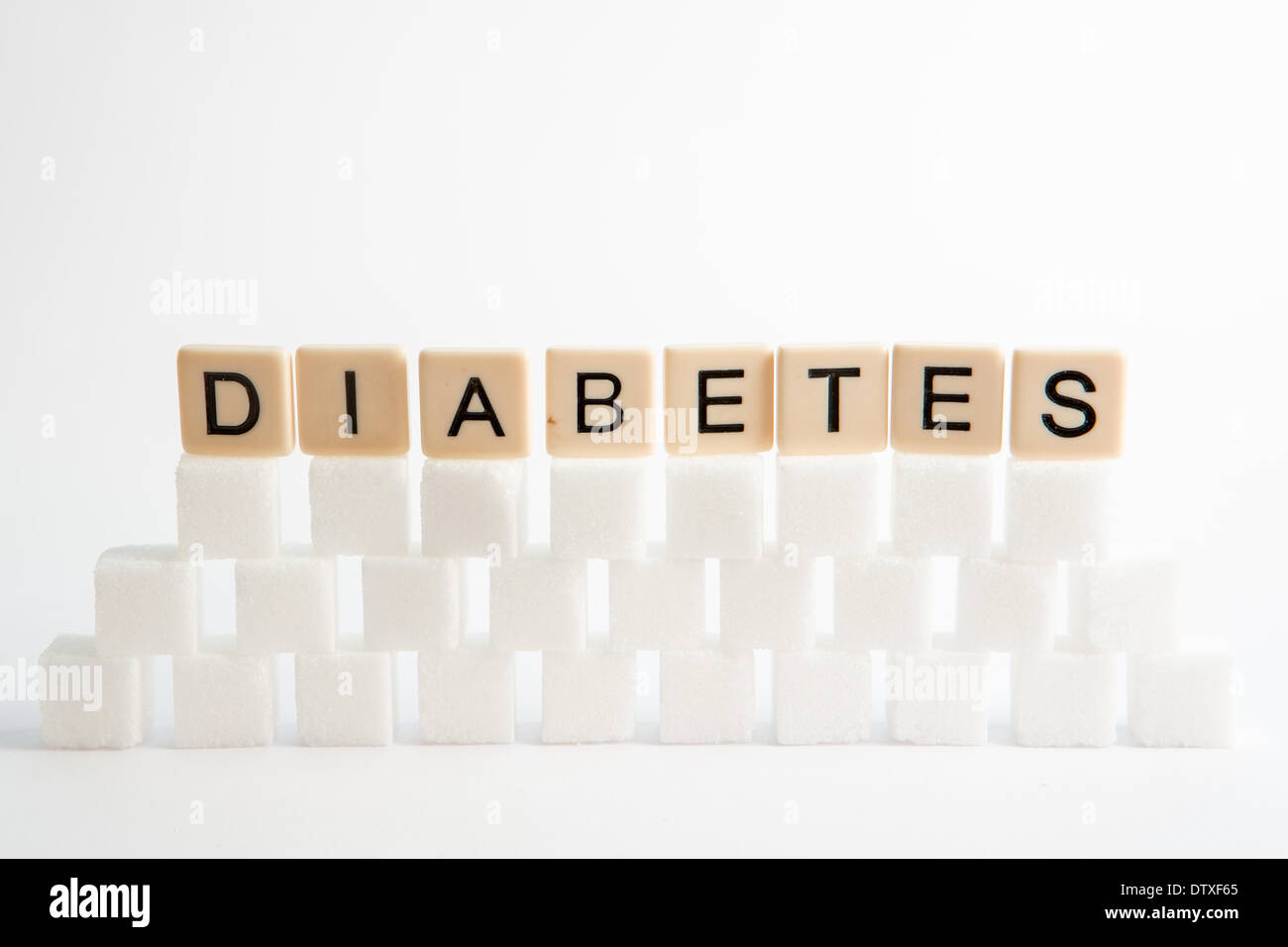 Sugar cubes and dice Stock Photo - Alamy