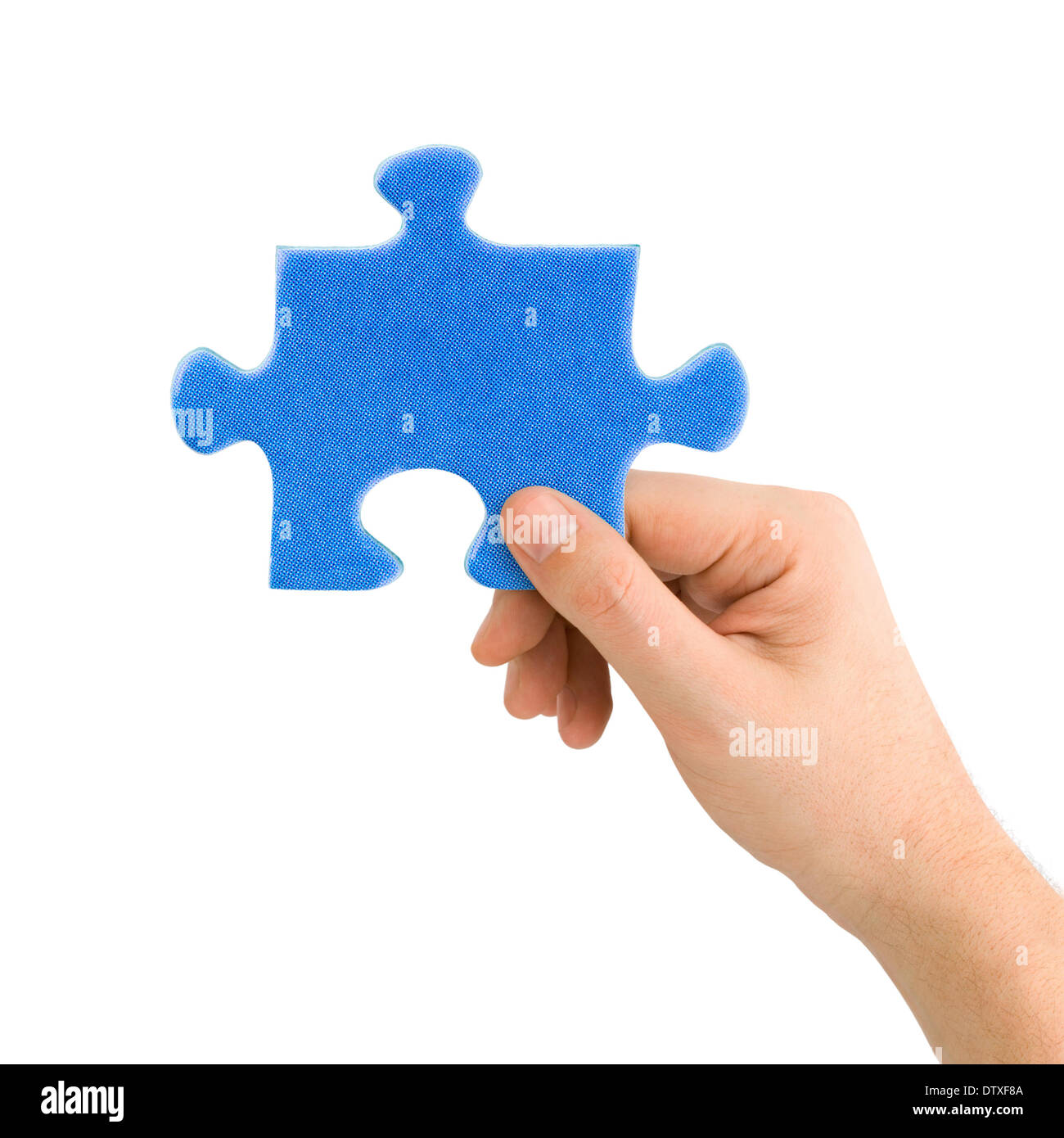 Hand and puzzle Stock Photo - Alamy