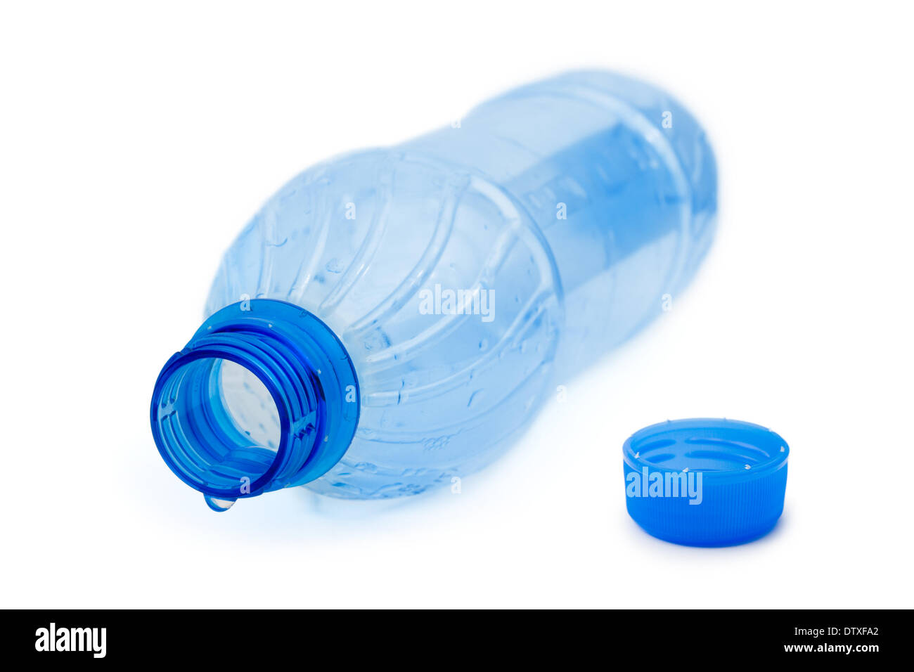 Empty bottle and water drop Stock Photo - Alamy