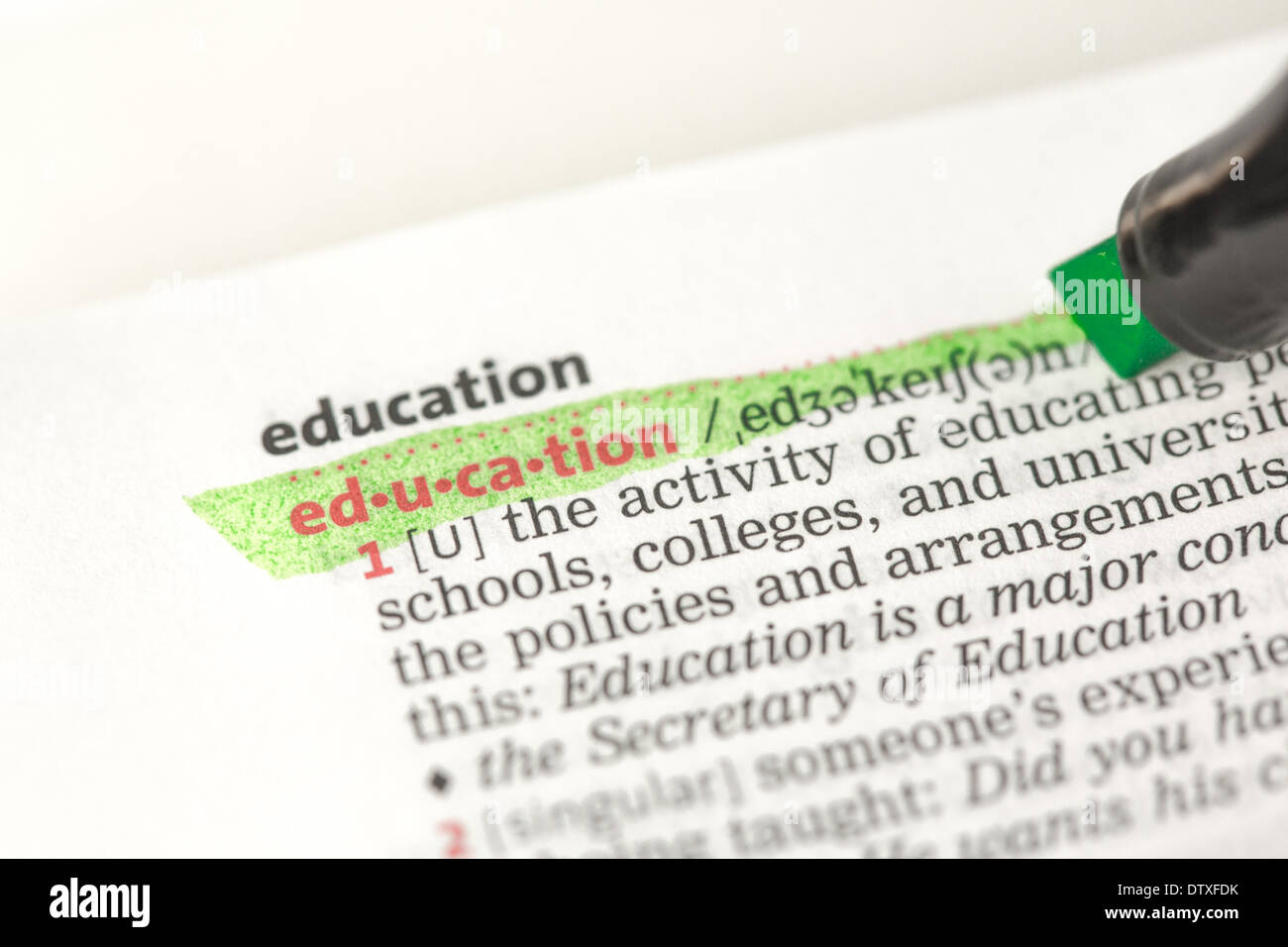 Education definition highlighted in green Stock Photo - Alamy