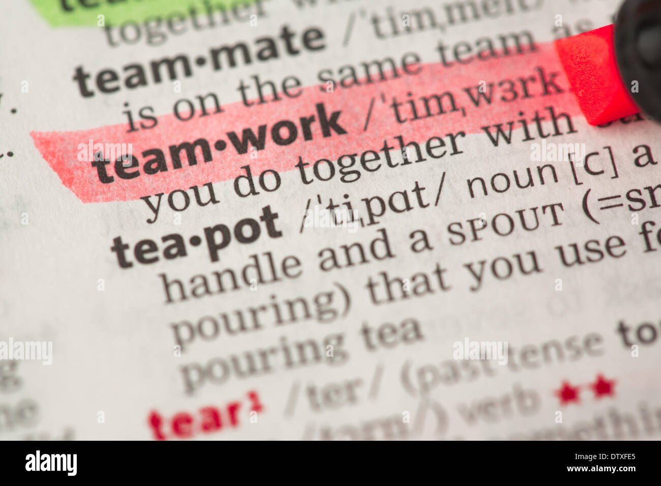 Teamwork definition highlighted in red Stock Photo - Alamy