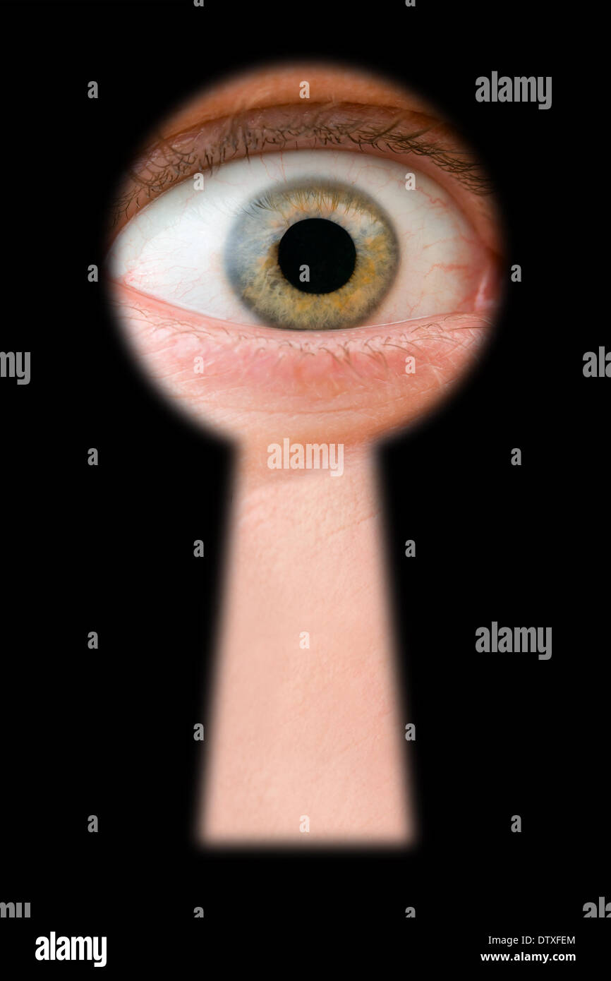 Eye in keyhole Stock Photo - Alamy