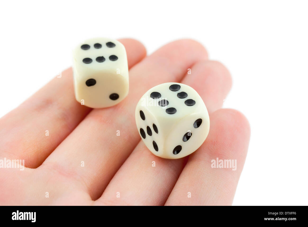 Two dices on hand Stock Photo - Alamy