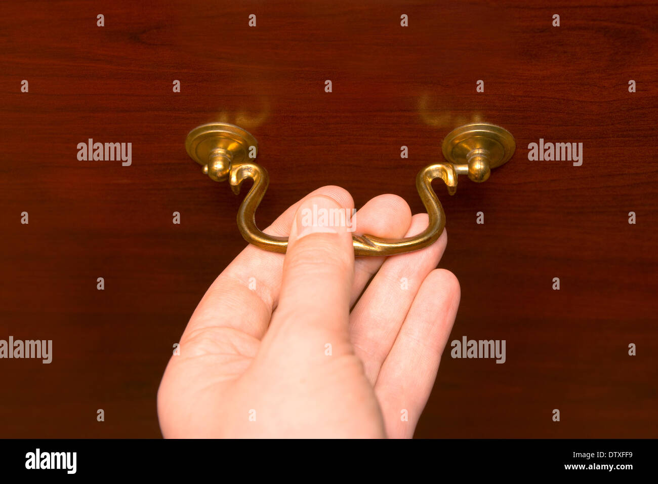 Hand opening a wooden box Stock Photo - Alamy