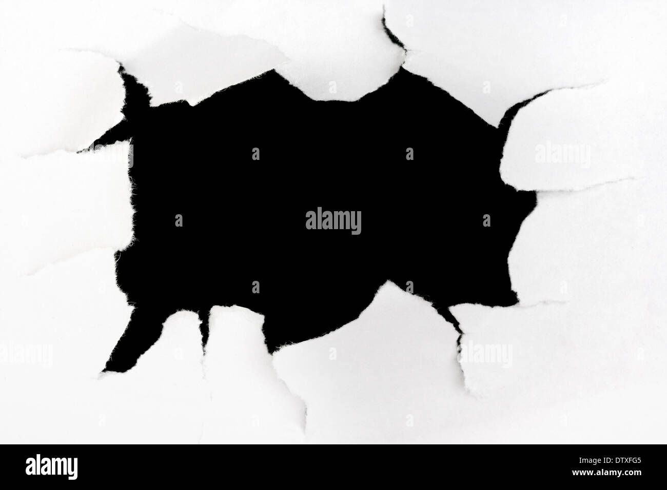 Hole on paper Stock Photo - Alamy