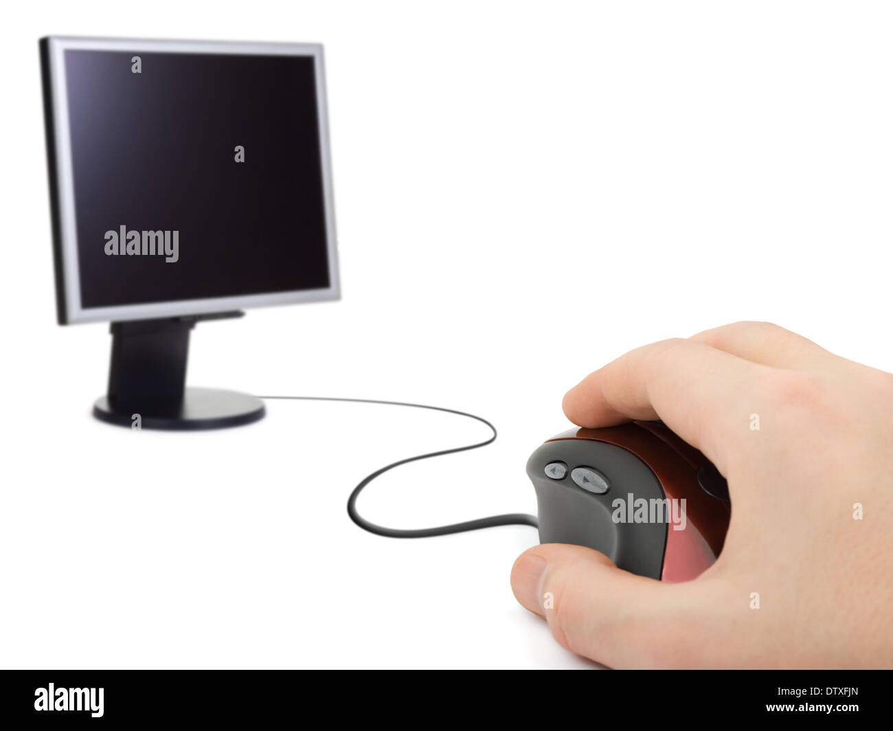 Hand with computer mouse and monitor Stock Photo - Alamy