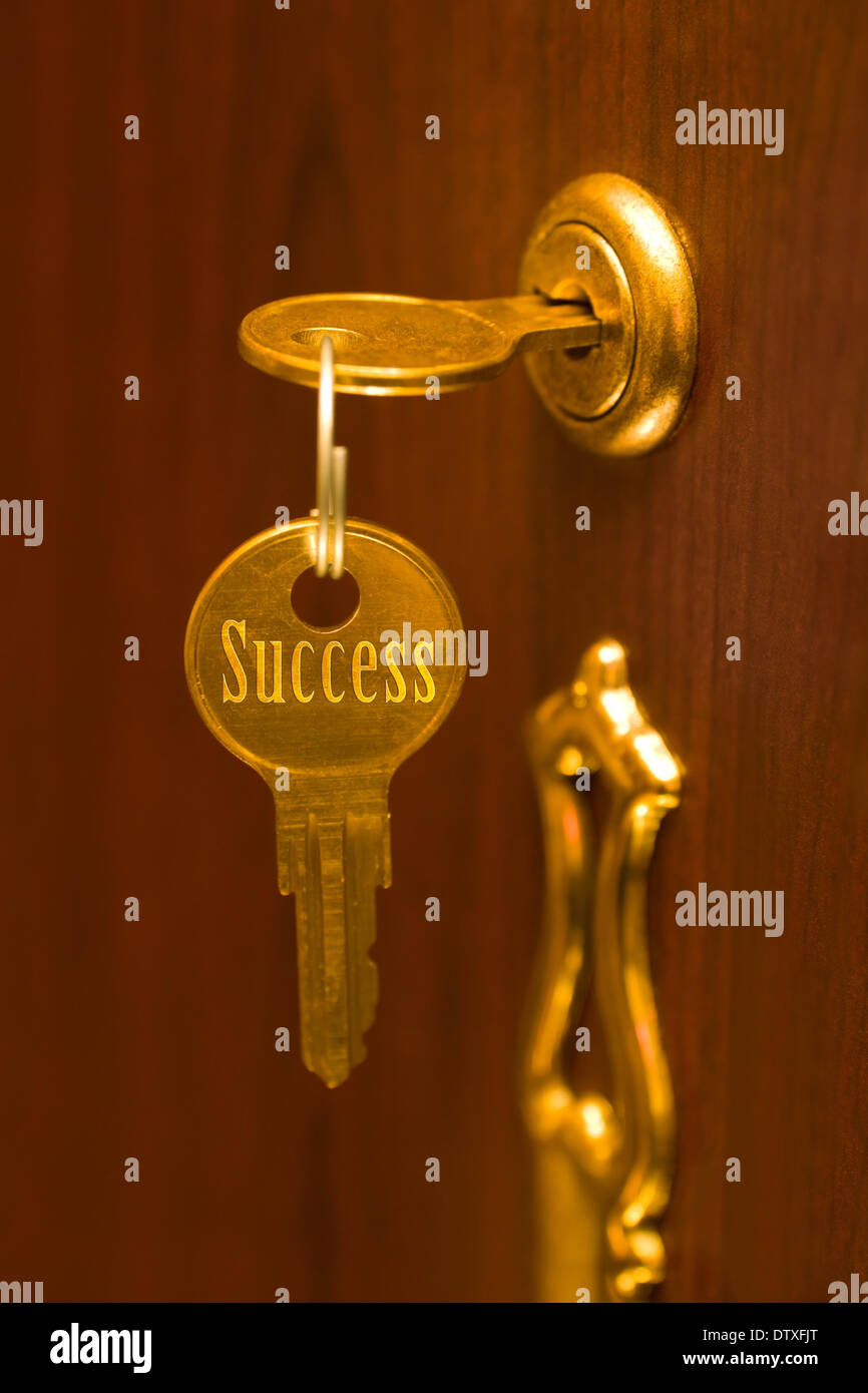 Golden key Success Stock Photo - Alamy