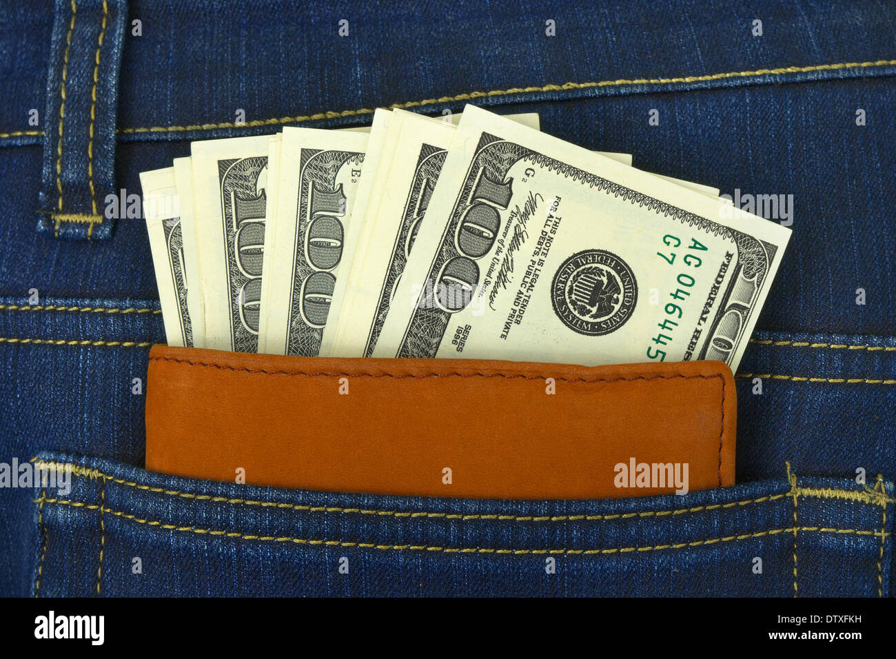 Money and wallet in jeans pocket Stock Photo - Alamy