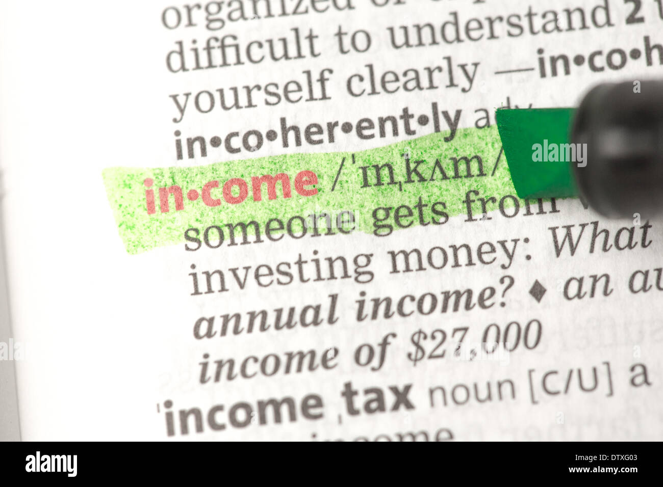 Income definition highlighted Stock Photo - Alamy