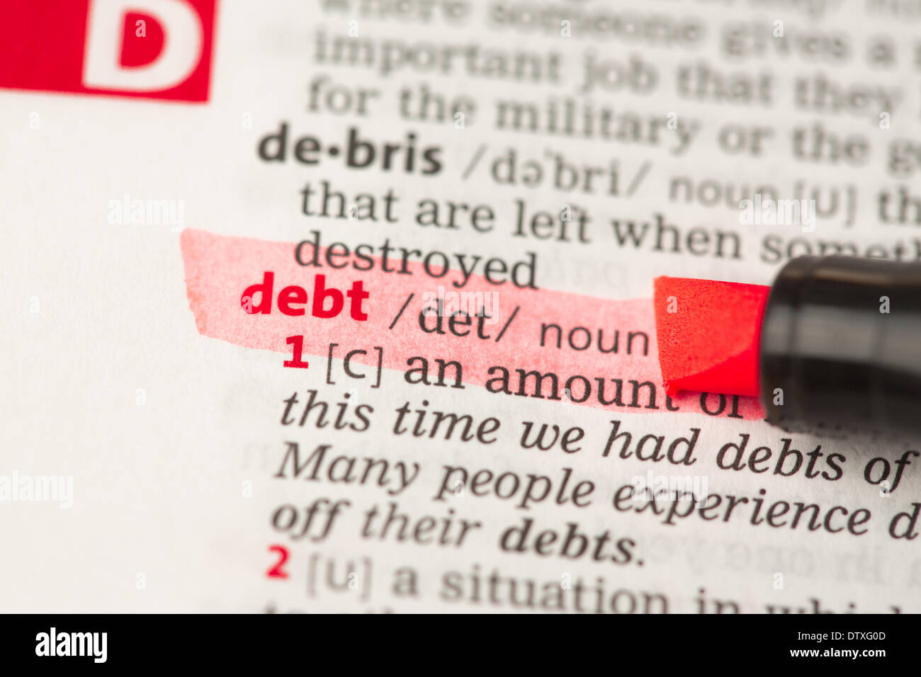 Debt definition highlighted in red Stock Photo - Alamy
