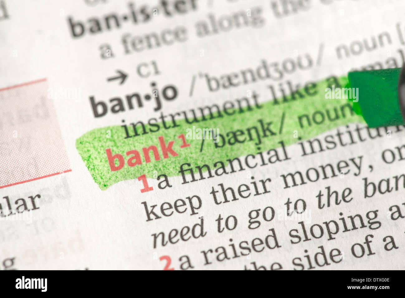 Bank definition highlighted in green Stock Photo - Alamy