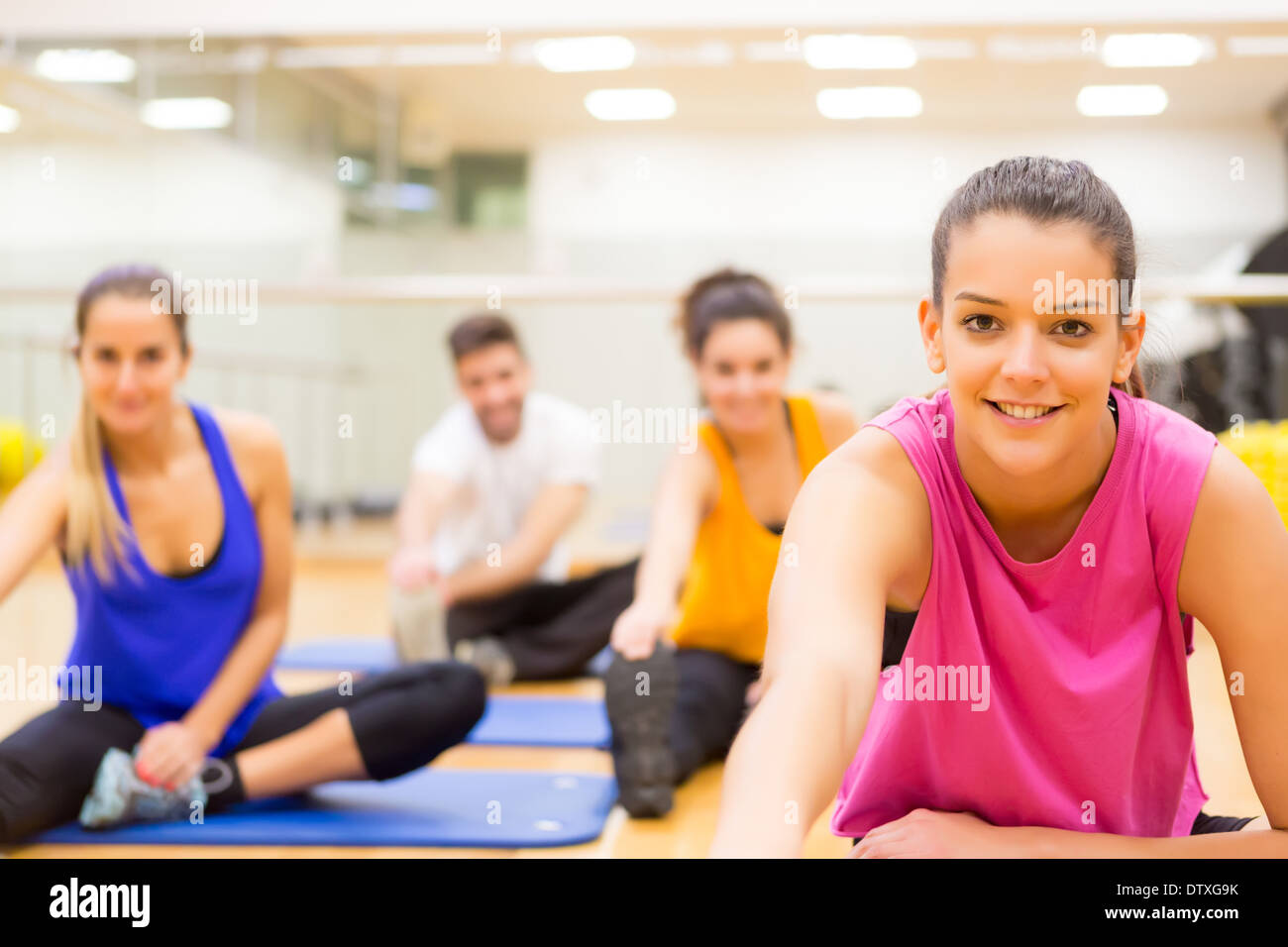 Group of friends working out at the gym Stock Photo - Alamy